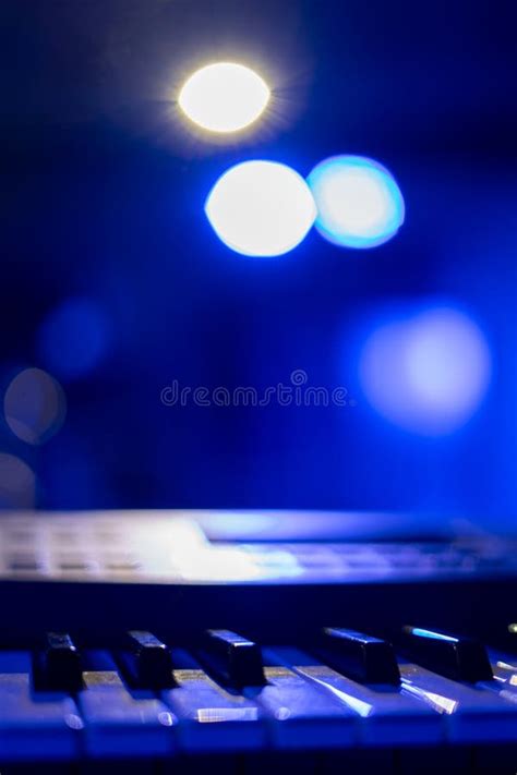 Piano Musical Keyboard On Stage With Blue Lights Stock Image Image Of