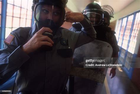 A Cell Extraction Team Prepares To Enter A Prisoners Cell Who Is Not