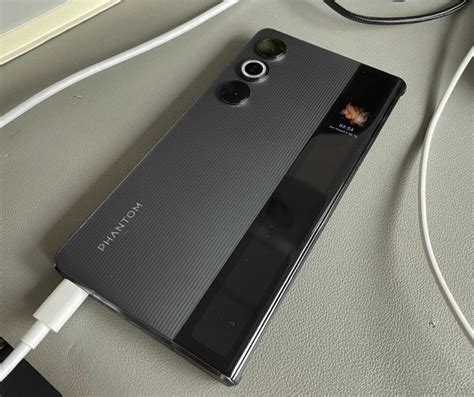 Tecno Uzanan Ekranlı Phantom Ultimate Modelini Təqdim Edib Tedroid