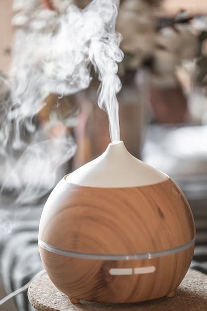 Free Photo Essential Oil Aroma Diffuser Humidifier Diffusing Water