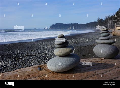 Rock Cairns Stacked Along Rialto Beach At Olympic National Park Near