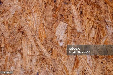 Osb 板是由棕色木屑磨成木制背景osb 木單板背景的頂視圖 緊密 無縫的表面 照片檔及更多 三夾板 照片 三夾板 定向纖維板 工業