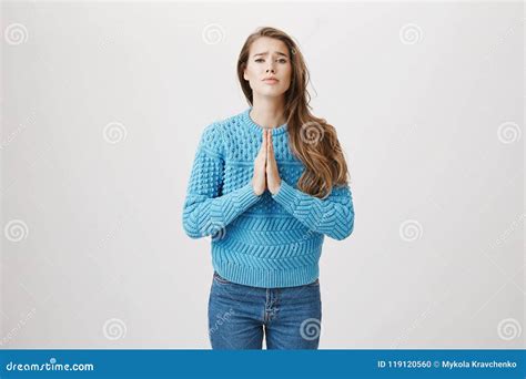Cute Attractive European Adult Woman Standing In Begging Pose With