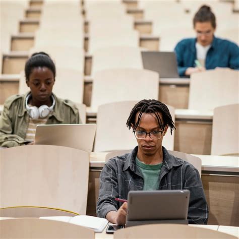 Free Photo Young Students Attending A Class