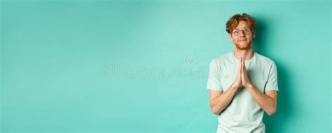 Cute Redhead Man Asking For Help Saying Please With Namaste Gesture