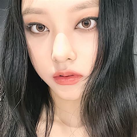 A Close Up Of A Person With Long Black Hair