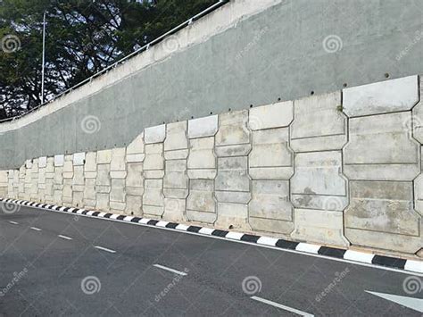 Precast Concrete Retaining Wall Panels Are Installed In Layers As A