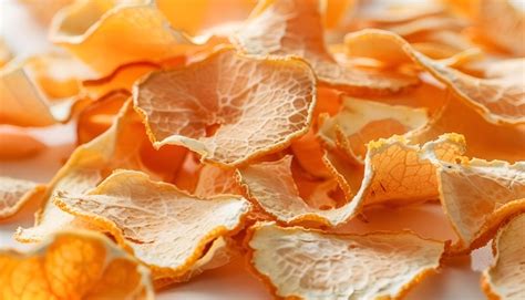 Many Dry Orange Peels On White Table Closeup Premium Ai Generated Image