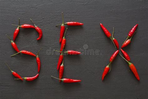 Word Sex Red Hot Chili Peppers On Black Background On Black Table Swx Letter Arranged From Red