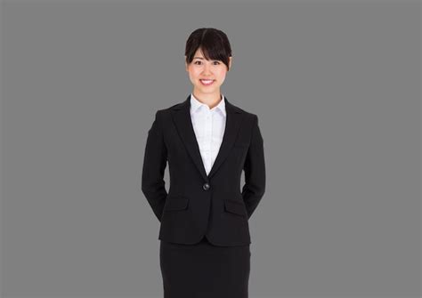 Premium Photo Portrait Of Businesswoman With Grey Background