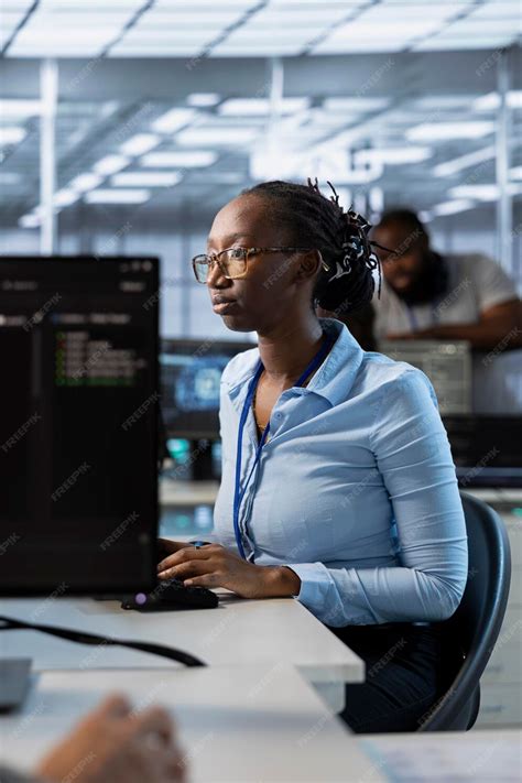 System Administrator In Data Center Optimizing It Infrastructure Free Photo