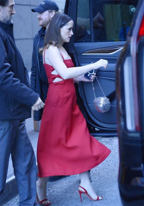 Claire Foy Wears A Red Dress And Red Stiletto Shoes Paired With A