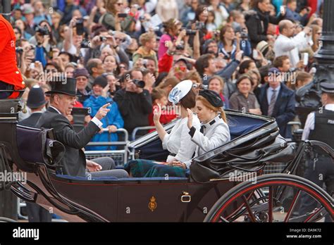 Prince Andrew With His Daughters Eugenie And Beatrice Return To