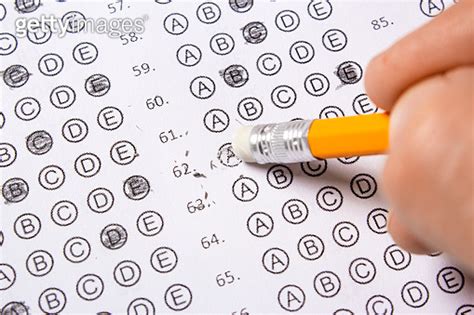 Blank Multiple Choice Answer Sheet Filled With Pencil Correcting The