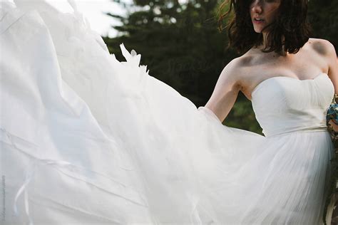 Bride With Flowy Dress By Stocksy Contributor Erin Drago Stocksy