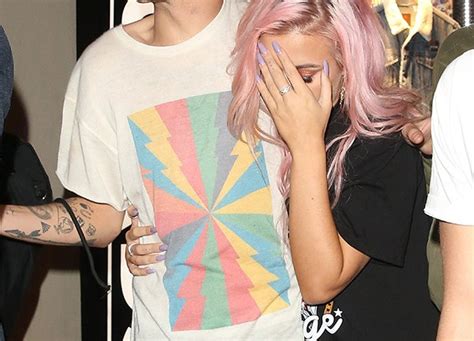 Pics Louis Tomlinson Cuddles Sister Lottie After Their Moms Death