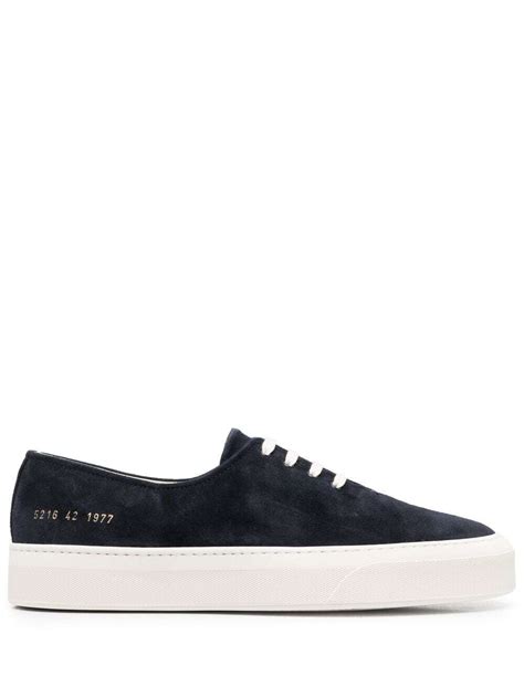 COMMON PROJECTS Four Hole Low Top Sneakers Editorialist