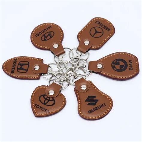 خرید و قیمت جا کلیدی چرمی با طرح آرم ماشین در طرح های مختلف جا سویچی ترب