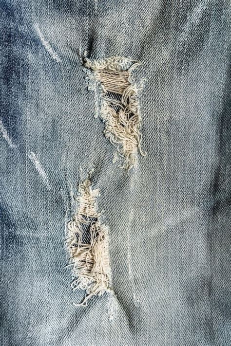 Agujero En Jeans Denim Fondo De Jeans Azules Destrozados Cerrar Textura