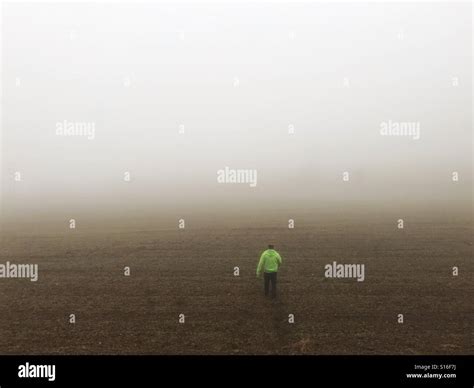 Man On A Fog Stock Photo Alamy
