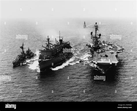 USS Sacramento AOE 1 Replenishing USS Ticonderoga CVA 14 And USS Basilone DD 824 In April