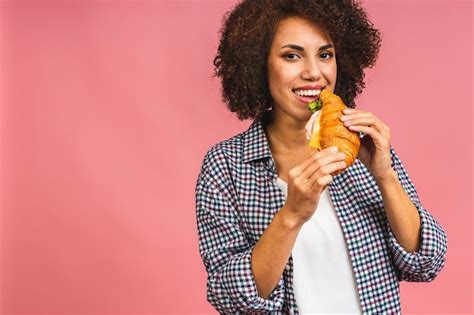 Premium Photo Hungry African American Beautiful Young Woman Eating