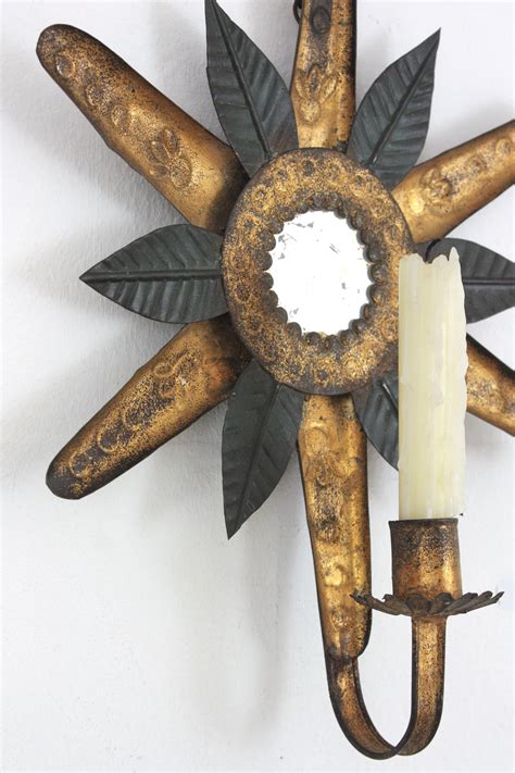 Sunburst Mirror Wall Candle Sconce In Black And Gilt Metal For Sale At