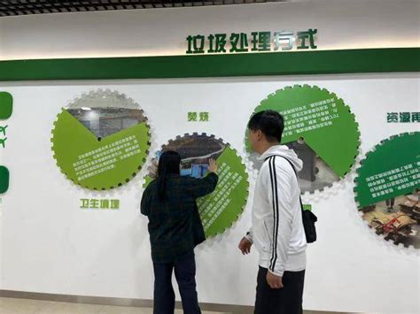 白云区金沙街组织市民参观垃圾分类宣教馆知识工作展板