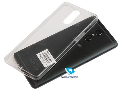 Mobile review com Обзор смартфона с двумя камерами DooGee Shoot