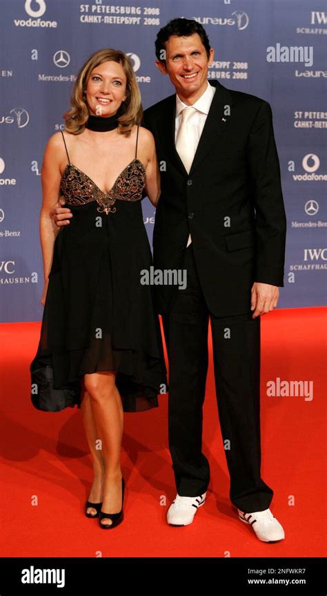 German Cyclist Michael Teuber And An Unidentified Woman Arrive For The Laureus Sports Awards In