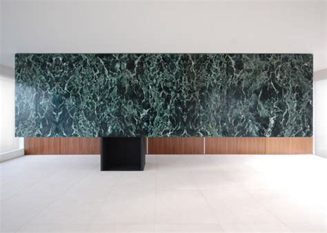 Monolithic Marble Partition Divides Antwerp Penthouse