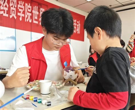 世界自闭症关注日｜“点亮心灯，与爱同行”志愿活动 南京财经大学国际经贸学院、江苏产业发展研究院、江苏现代服务业研究院（现代服务业协同创新中心