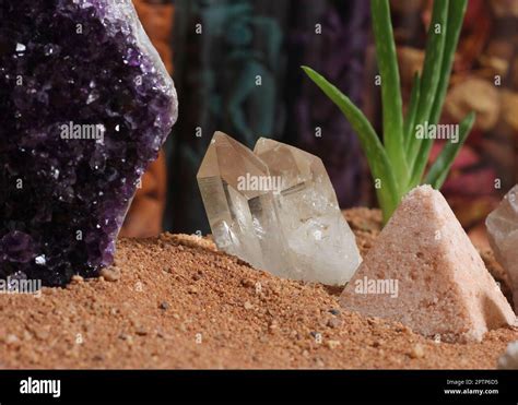 Amethyst Stone And Quartz Crystals On Australian Red Sand Meditation