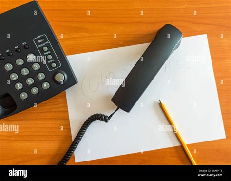 The Black Desktop Push Button Telephone On Desk In Office Black Phone