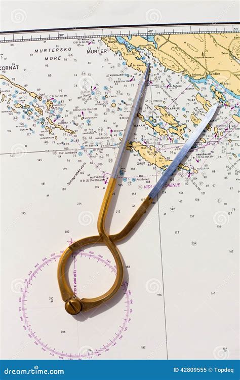 Pair Of Compasses For Navigation On A Sea Map Stock Image Image Of
