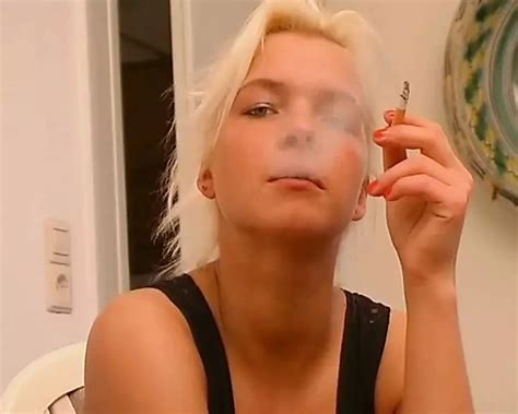 Stunning Looking German Blonde Adores Smoking While Taking A Cock Deep