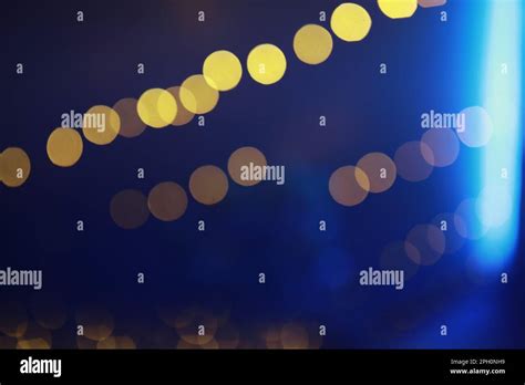 Abstract Bokeh Background Golden Bokeh Circles On A Dark Blue