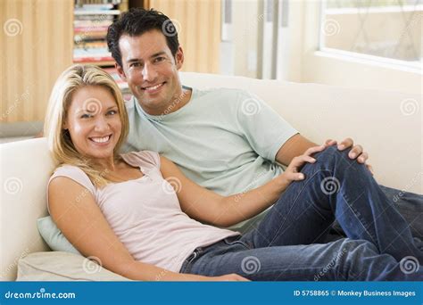 Couple In Living Room Smiling Stock Image Image Of Sitting Partners