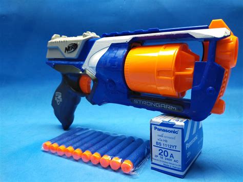 Nerf ปืนnerf ของเล่น ปืนเนิร์ฟ Strongarm และ Disruptor ไกส้มยิงดี ของ