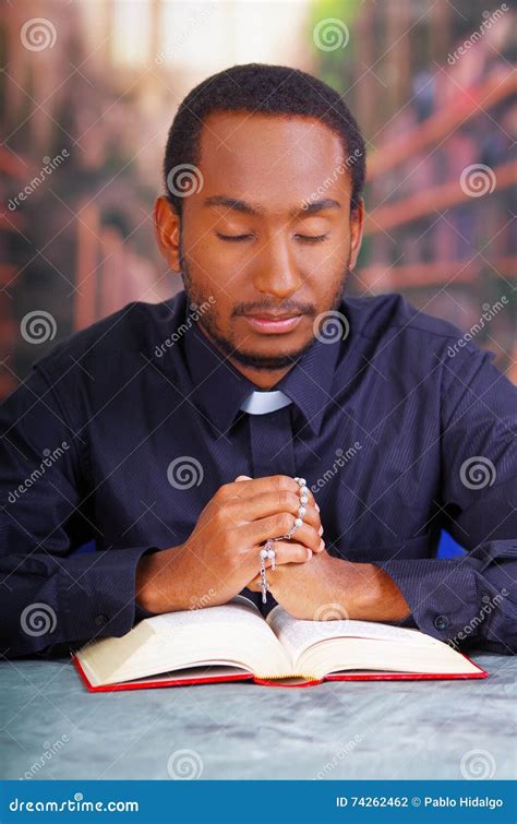 Catholic Priest Wearing Traditional Clerical Collar Shirt Sitting With