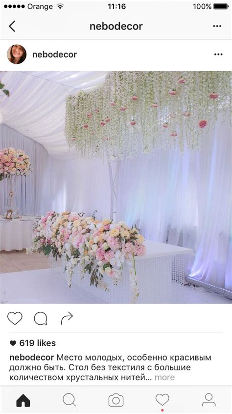 An Instagram Page With Flowers And Chandelier Hanging From It S Ceiling