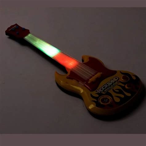 Rockband Music Guitar With Light And Pre Stored Notes With Nylon Wires