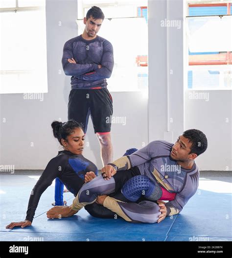 Full Length Shot Of A Jiu Jitsu Sensei Sparring With One Of His