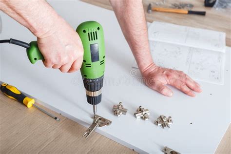Furniture Assembly Using Drill Male Hands Master Collects Furniture
