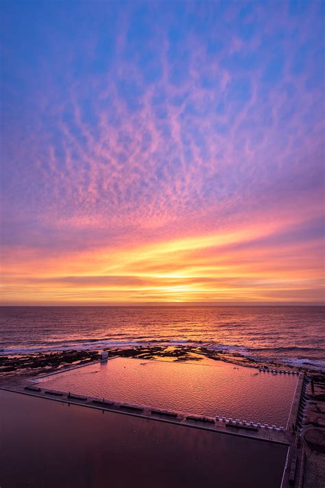 Sunrise Clouds And Fog At Sunrise Photograph By Marc Crumpler Walemper