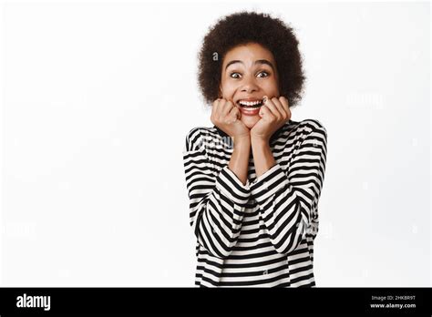 Image Of Excited African Girl Gasping In Awe Looking Surprised And