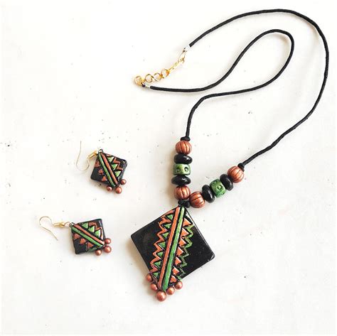 Terracotta Casual Wear Geometric Design Pendant And Earrings Set Mintorie