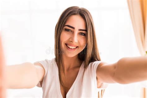 Girl Taking Selfie From Phone In The Morning In Bed At Home Stock Image