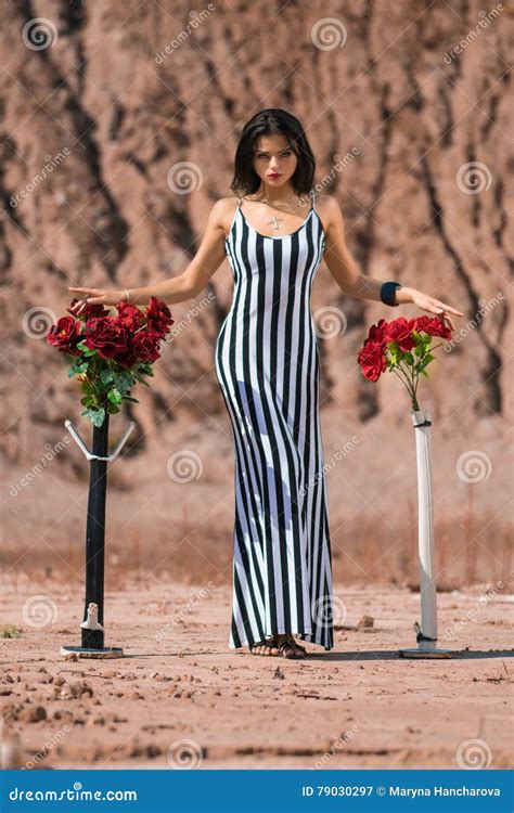 Beautiful Young Fashion Model Posing On The Rocks Stock Image Image