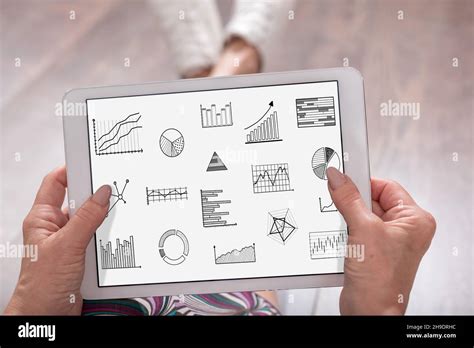 Graphical Analysis Concept Shown On A Tablet Held By A Woman Stock Photo Alamy